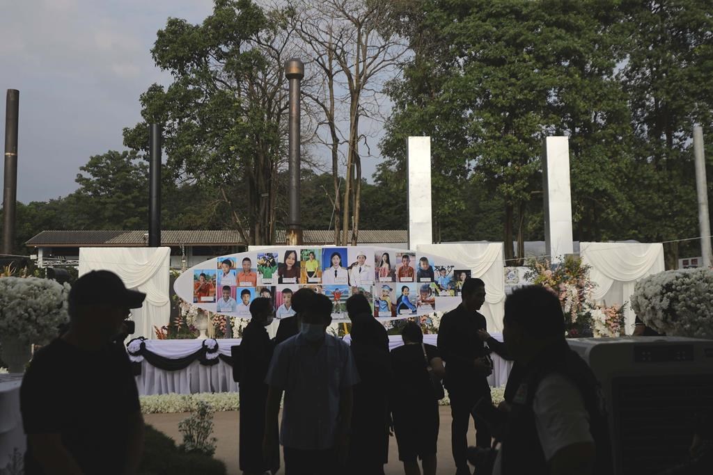 Small town in Thailand hold mass cremation for 23 who died in a school ...