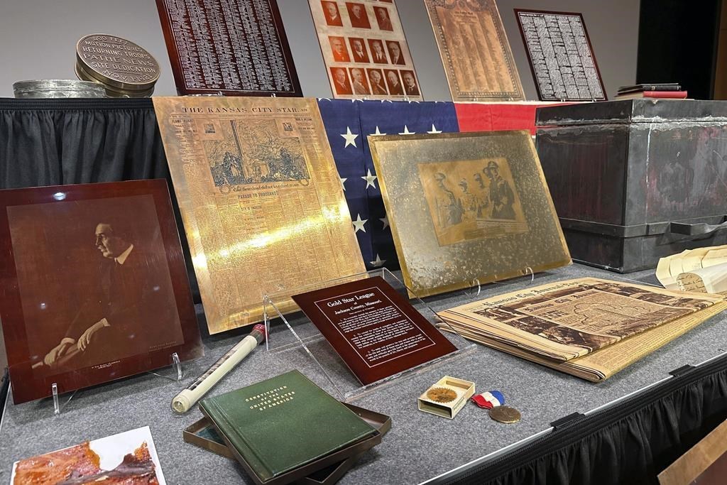 A century-old time capsule’s contents are unveiled in Kansas City ...