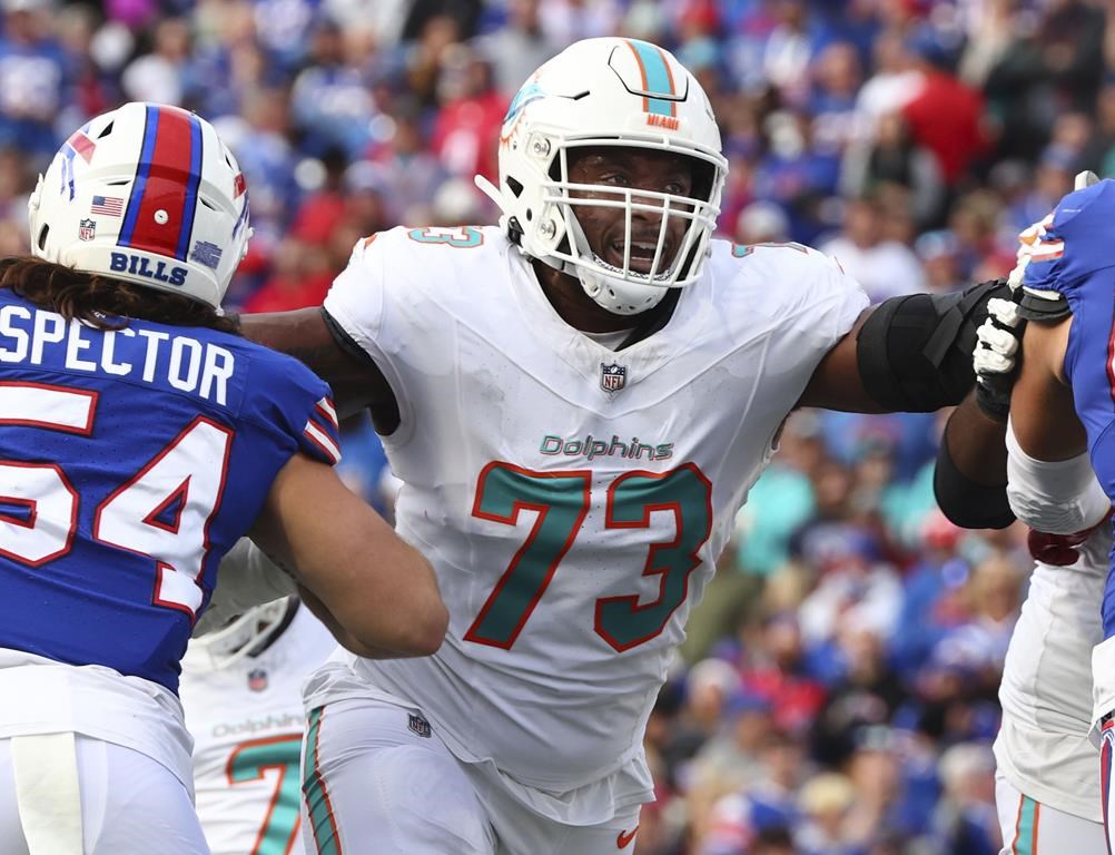 Dolphins place right tackle Austin Jackson on injured reserve and ...