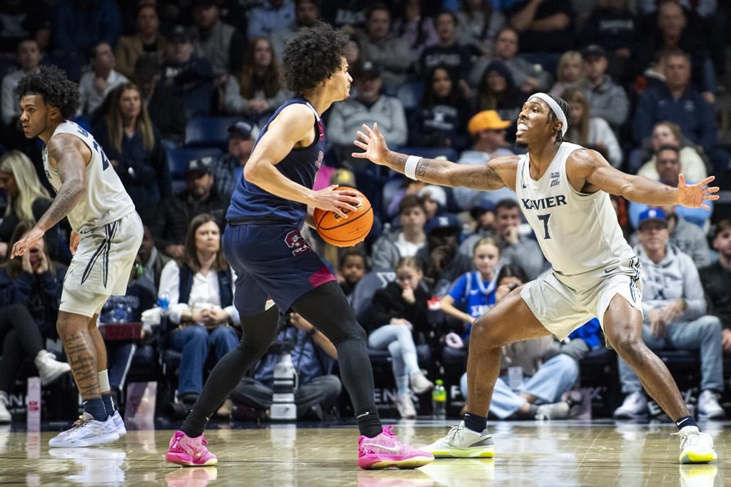 Freemantle scores 17, McKnight 14 as No. 22 Xavier holds on to beat SC ...