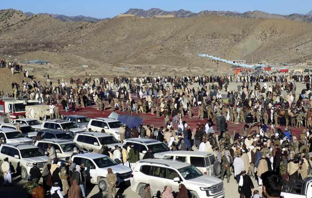 Thousands attend the funeral of a Taliban minister killed by an Islamic ...