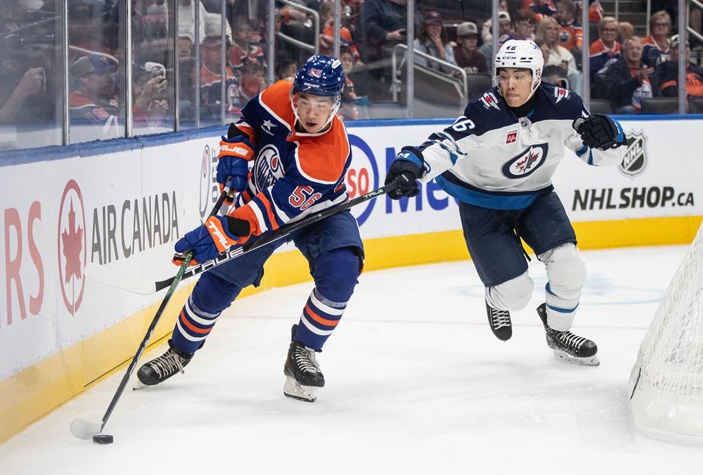 Jets’ Kevin He becomes first Chinese-born player to sign NHL contract ...