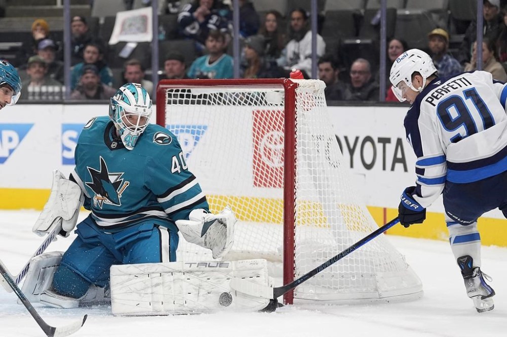 Lowry scores late goal to help Jets sink Sharks 4-3 – Winnipeg Free Press