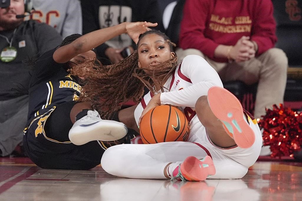 Watkins scores 31 points to propel No. 4 Southern California past No. 23 Michigan, 78-58 ...
