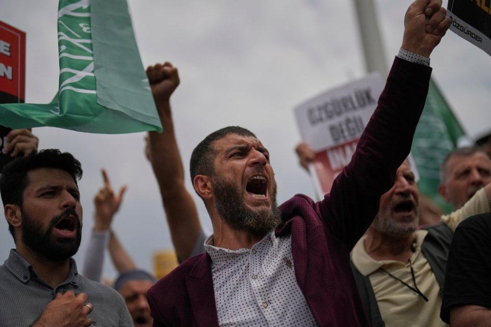 Turkish police detain 3 more employees of satirical magazine over ...