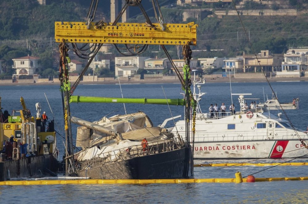 Superyacht is pulled from the depths 10 months after sinking off Sicily ...