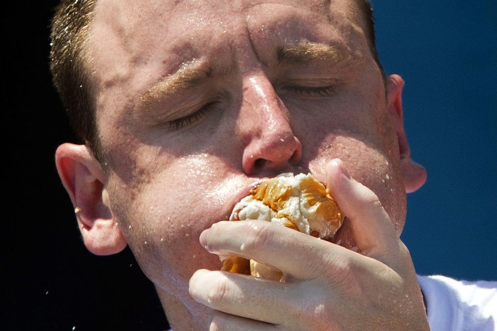 Joey Chestnut reclaims title in Nathan’s Famous hot dog eating contest ...