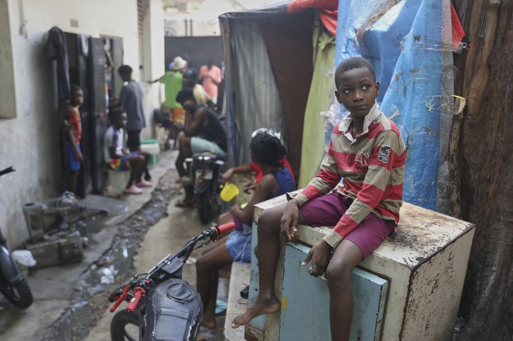 Haitians yearn for home as gangs welcome them and police warn it’s too ...