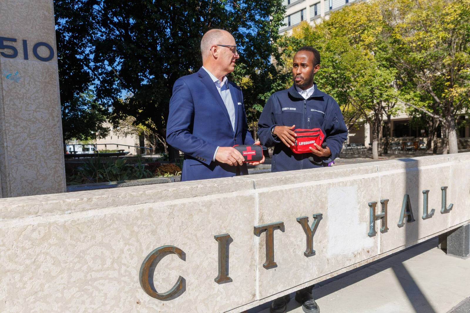 Mayor, security guard rush to save man overdosing outside city hall ...
