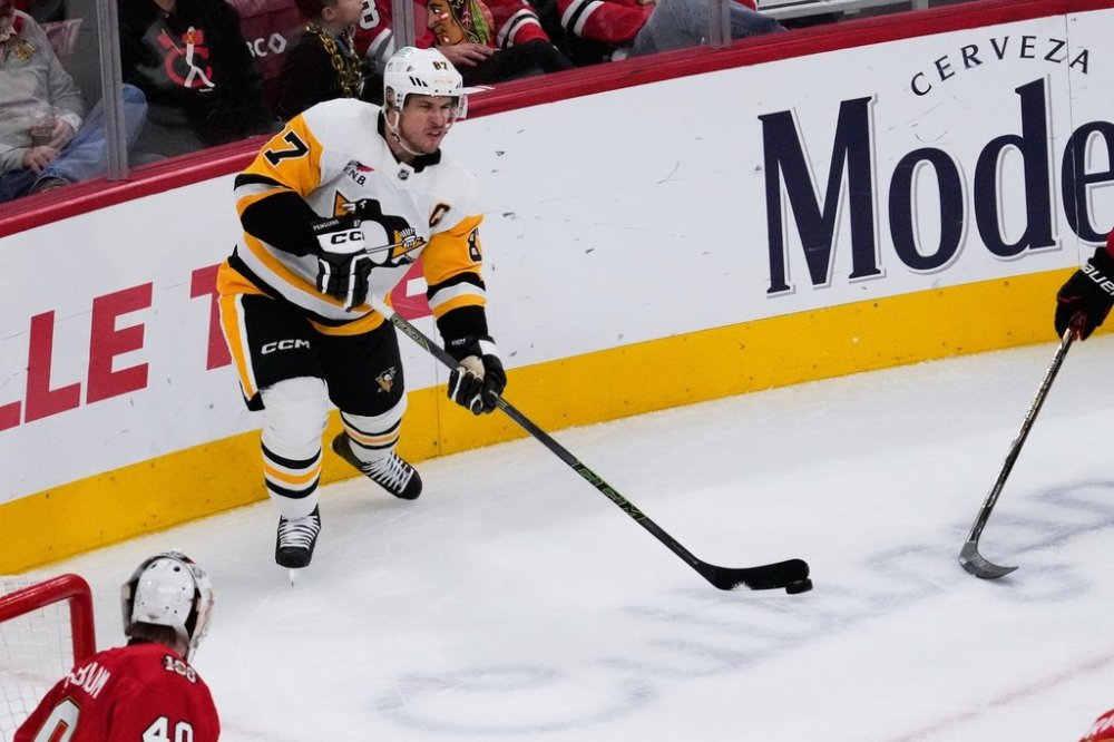 Brazeau has hat trick, Rust scores twice as Penguins rout Blackhawks 7 ...