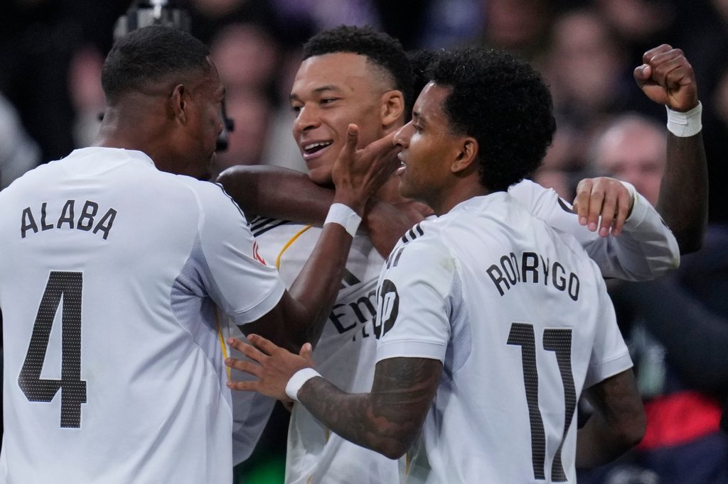 Mbappé’s last-gasp penalty lifts Real Madrid to 2-1 win over Rayo ...
