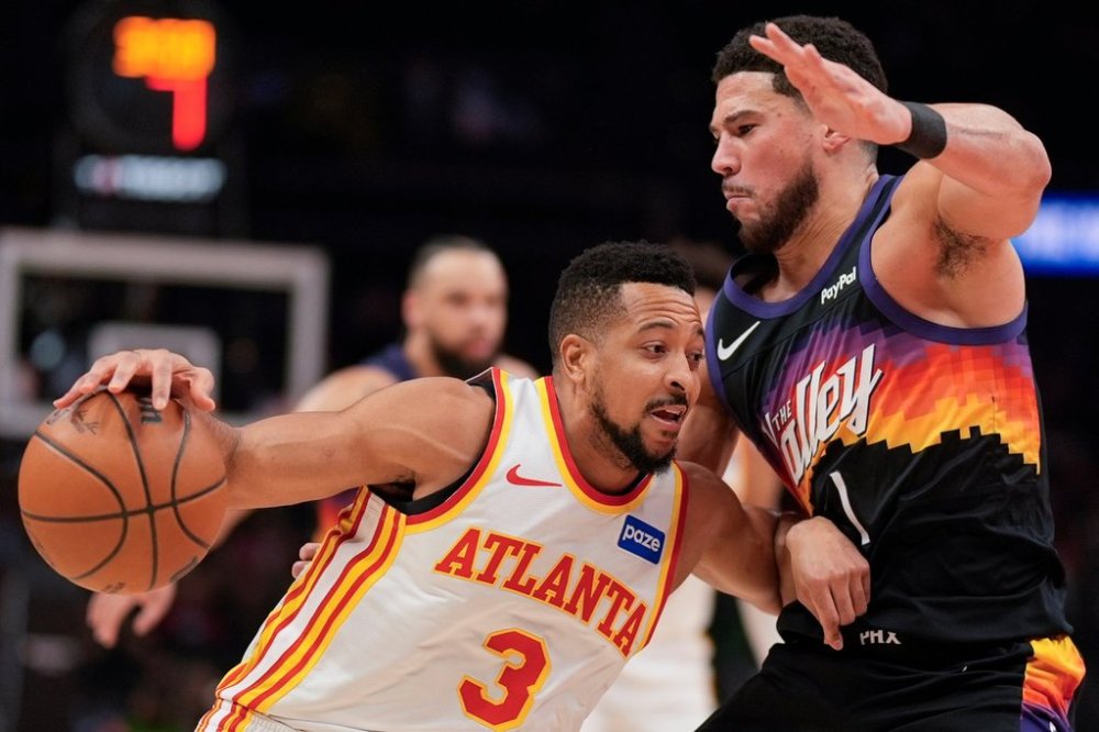 Suns’ Devin Booker rolls his ankle and Jalen Green also hurt in loss to ...
