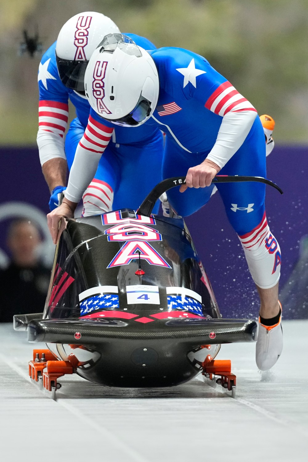 Germany’s Johannes Lochner starts fast in Olympic 2-man bobsled race ...