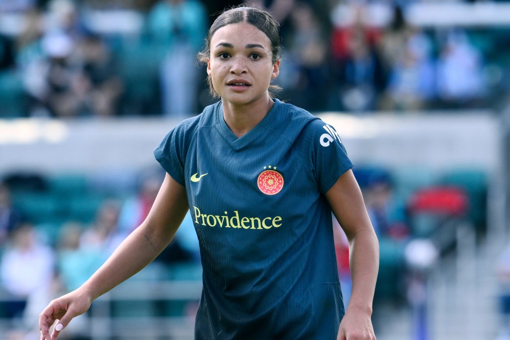 Smith plays for the Portland Thorns after missing last season for the ...