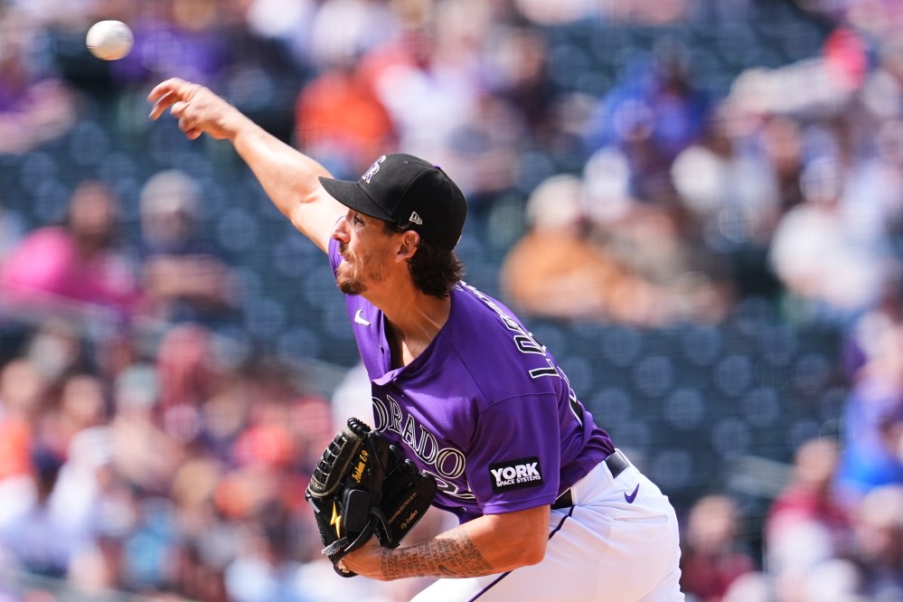 Michael Lorenzen throws efficiently into the 6th, Rockies beat Astros 9 ...