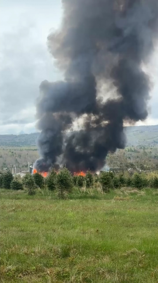 Firefighter killed, 11 injured in lumber mill explosion and massive ...
