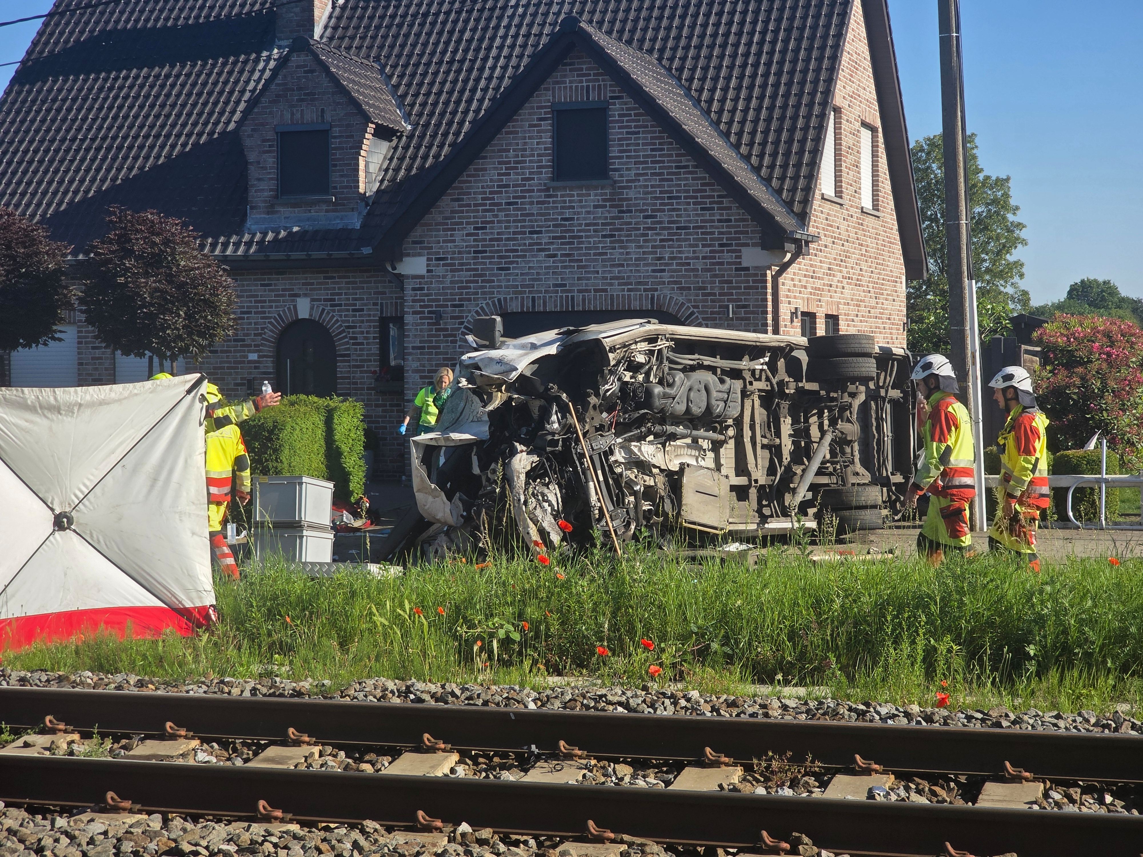 A train collides with a minibus of children in Belgium and 4 people are ...