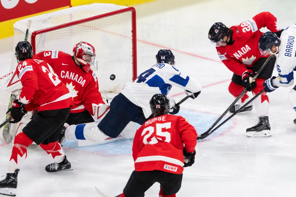 Finland upsets Canada to set up final against Switzerland at ice hockey ...