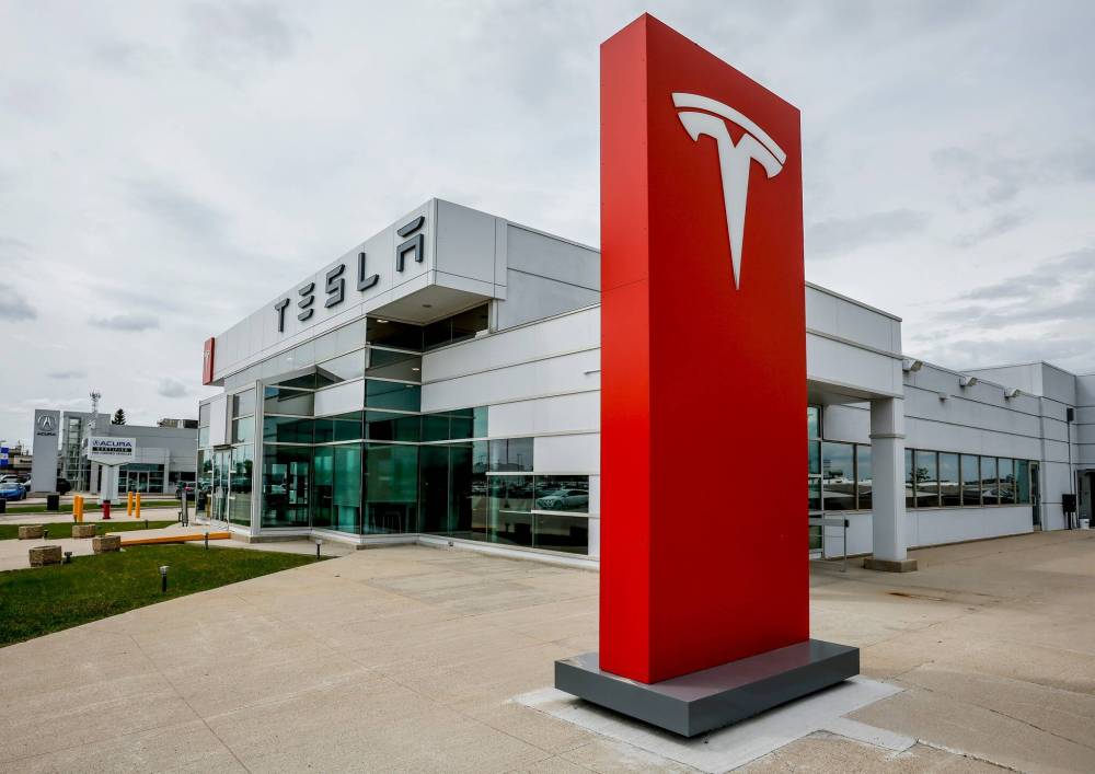 Tesla Canada takes province to court over EV rebates – Winnipeg Free Press